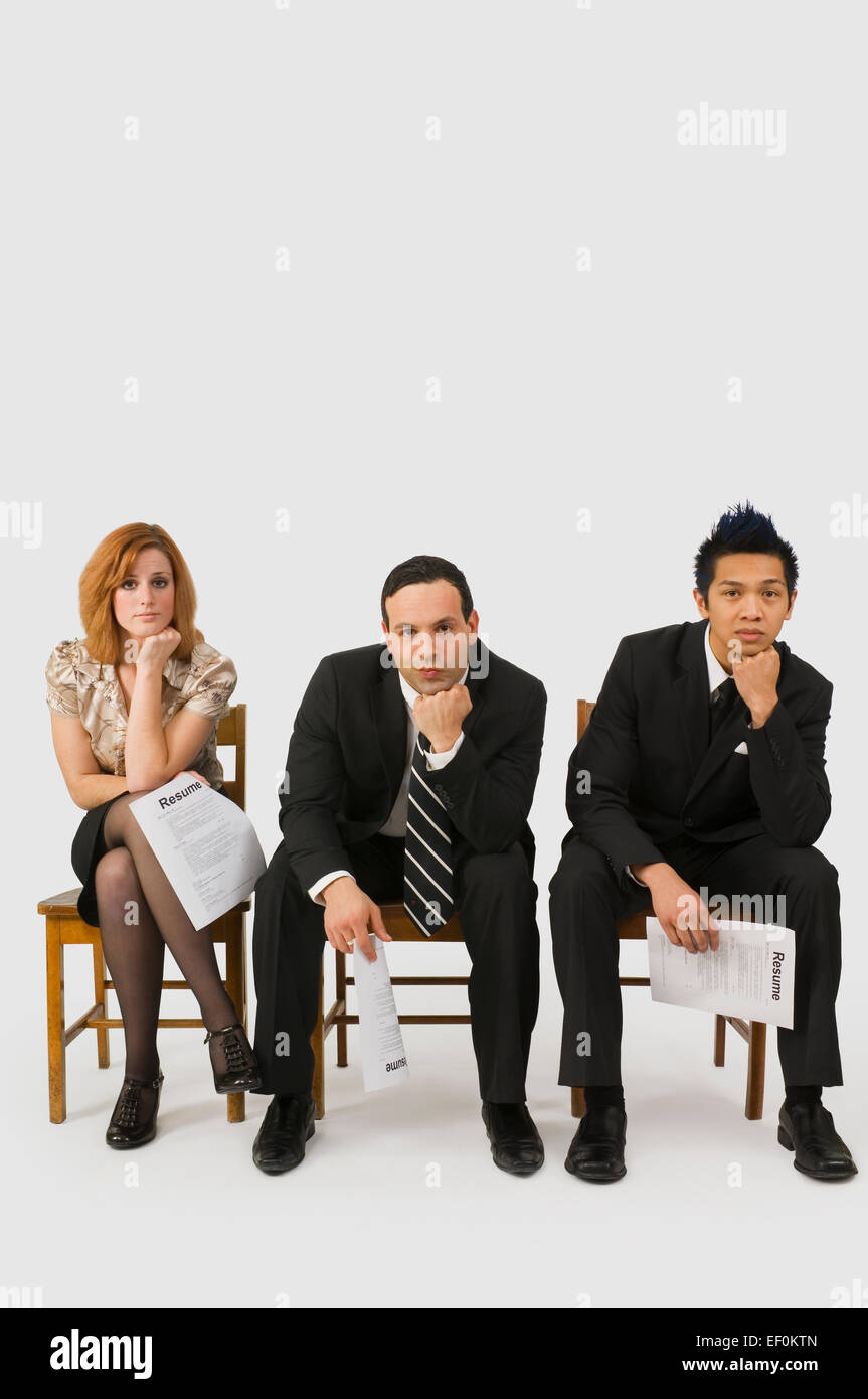 Three people waiting for interview Stock Photo - Alamy