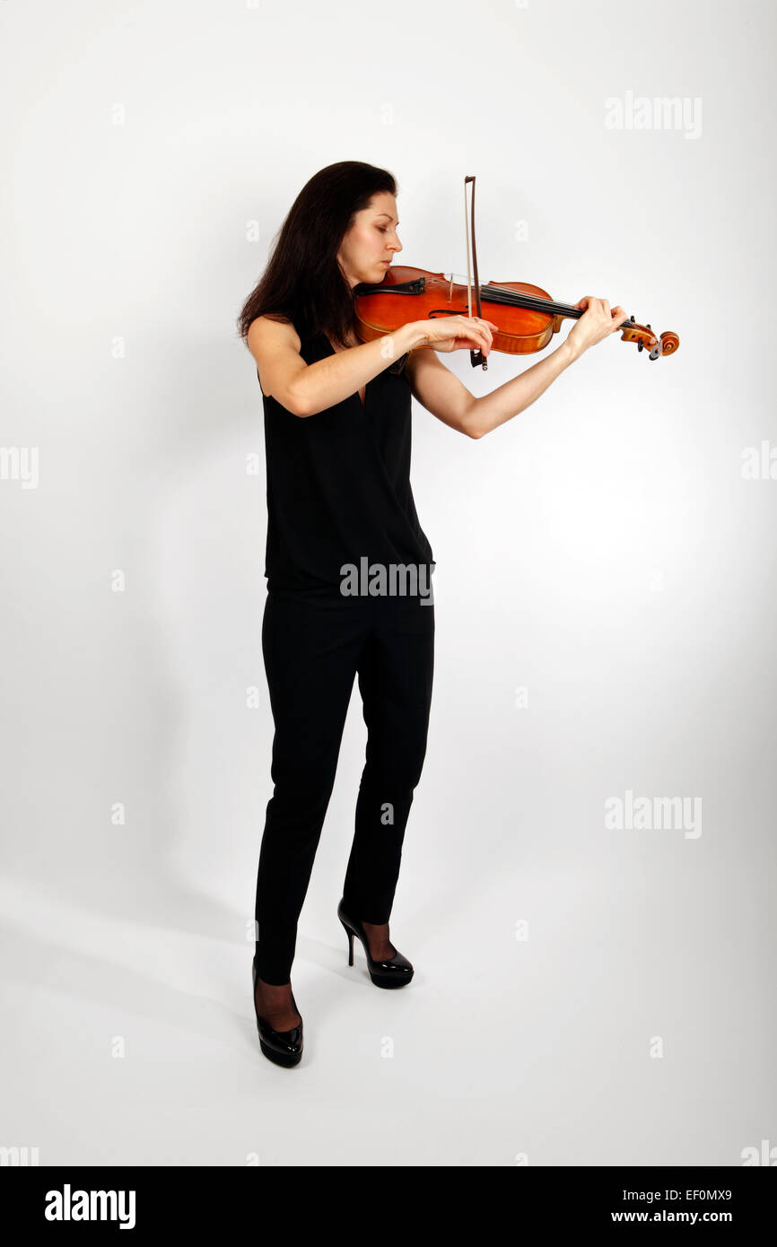 Viola player, playing her musical instrument Stock Photo - Alamy