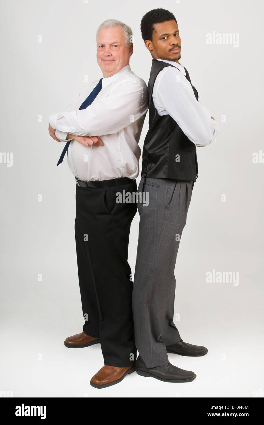 Two businessmen standing back to back Stock Photo - Alamy Two businessmen standing back to back Stock Photo - Alamy