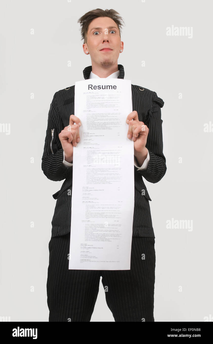Man holding a very long resume Stock Photo - Alamy