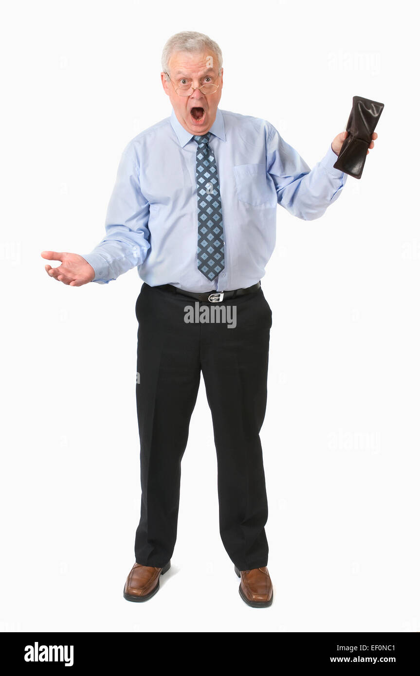 Upset businessman holding empty wallet Stock Photo - Alamy
