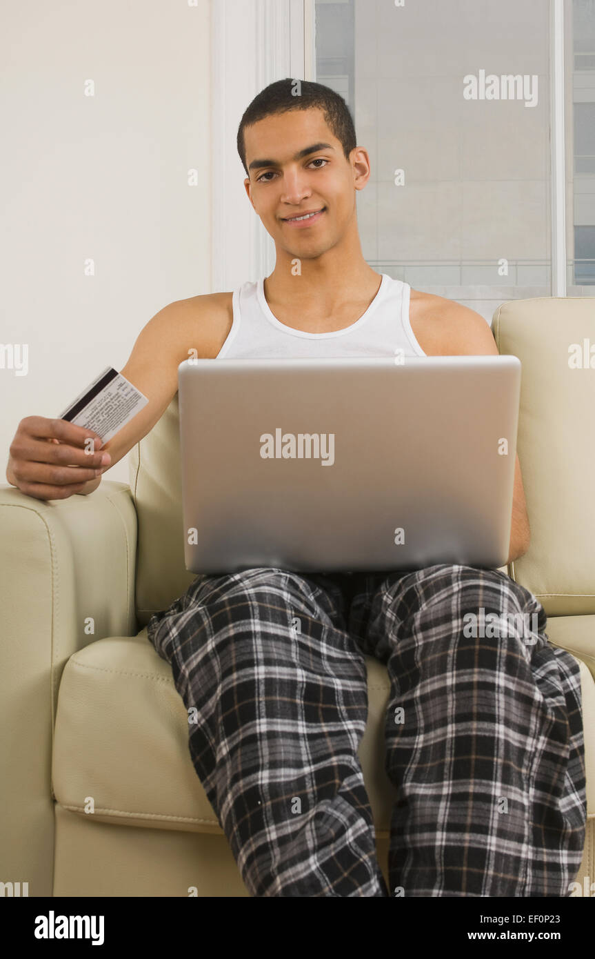 Mixed race happy online shoppers hi-res stock photography and images ...