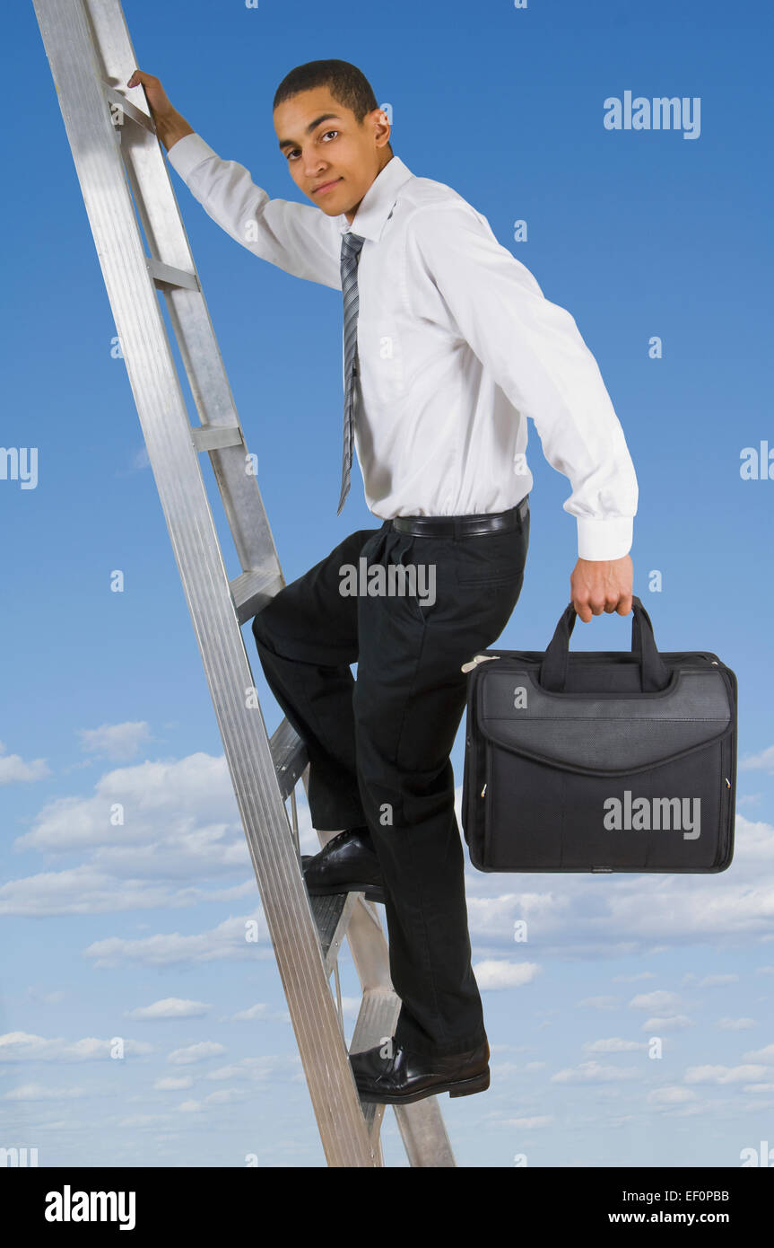 Businessman climbing up ladders hi-res stock photography and images - Alamy