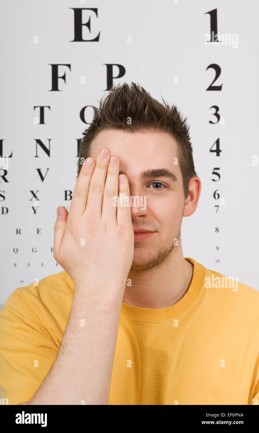 Man having eye test Stock Photo - Alamy