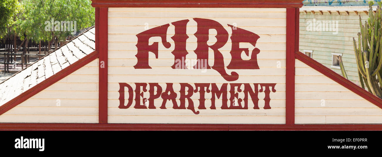 Old fire department sign painted on wood Stock Photo - Alamy