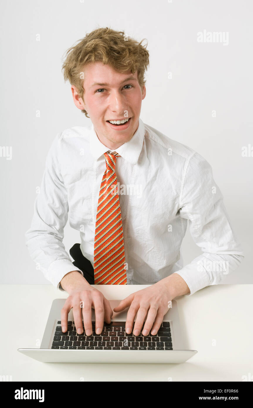 Man working on laptop Stock Photo - Alamy