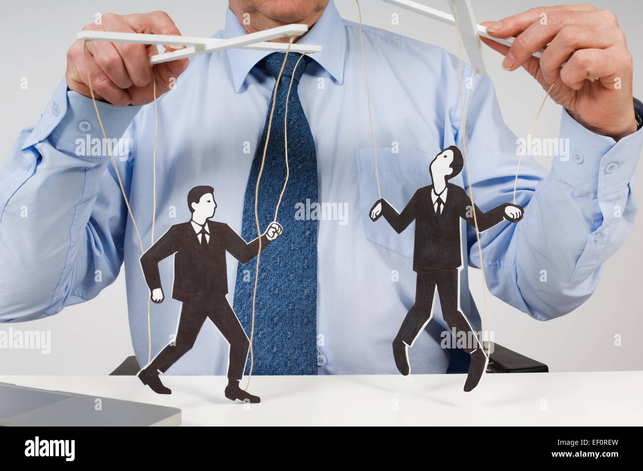 Hand controlling strings puppet businessman hi-res stock photography ...
