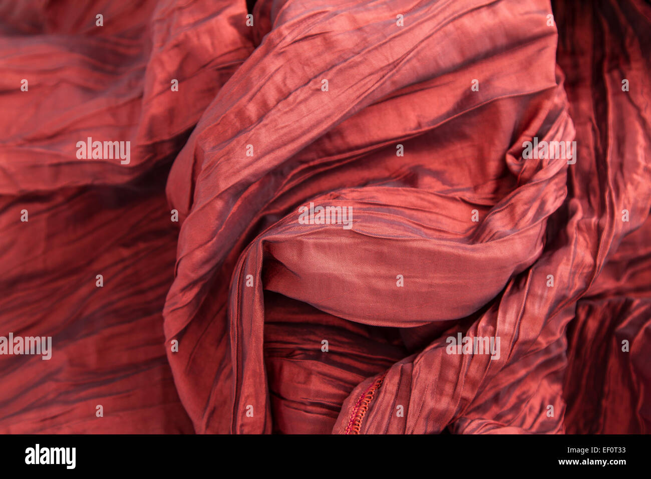 A fancy wrinkled red fabric background Stock Photo - Alamy