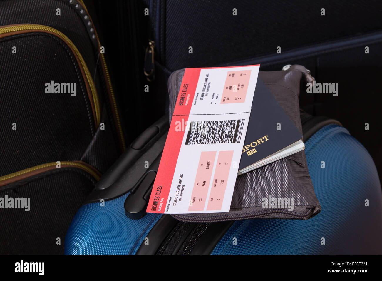 Airline ticket, passport and luggage, ready to travel Stock Photo - Alamy