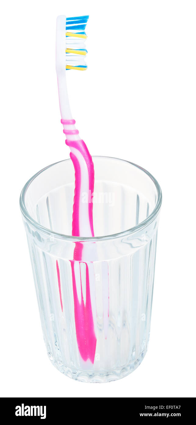 one pink tooth brush in glass isolated on white background Stock Photo ...