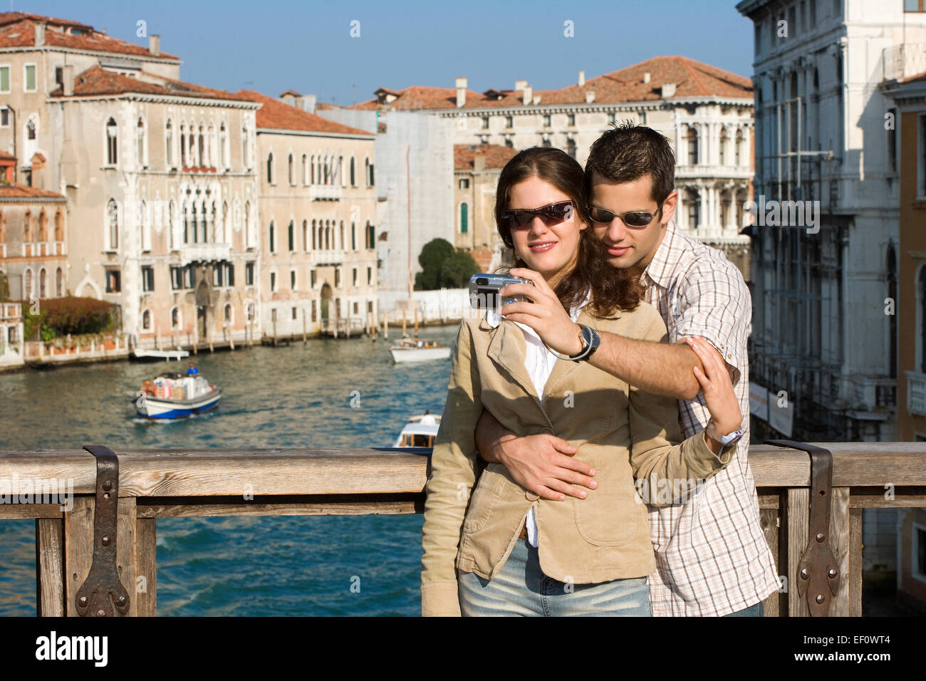 Couple taking a self portrait in Venice Italy Stock Photo - Alamy