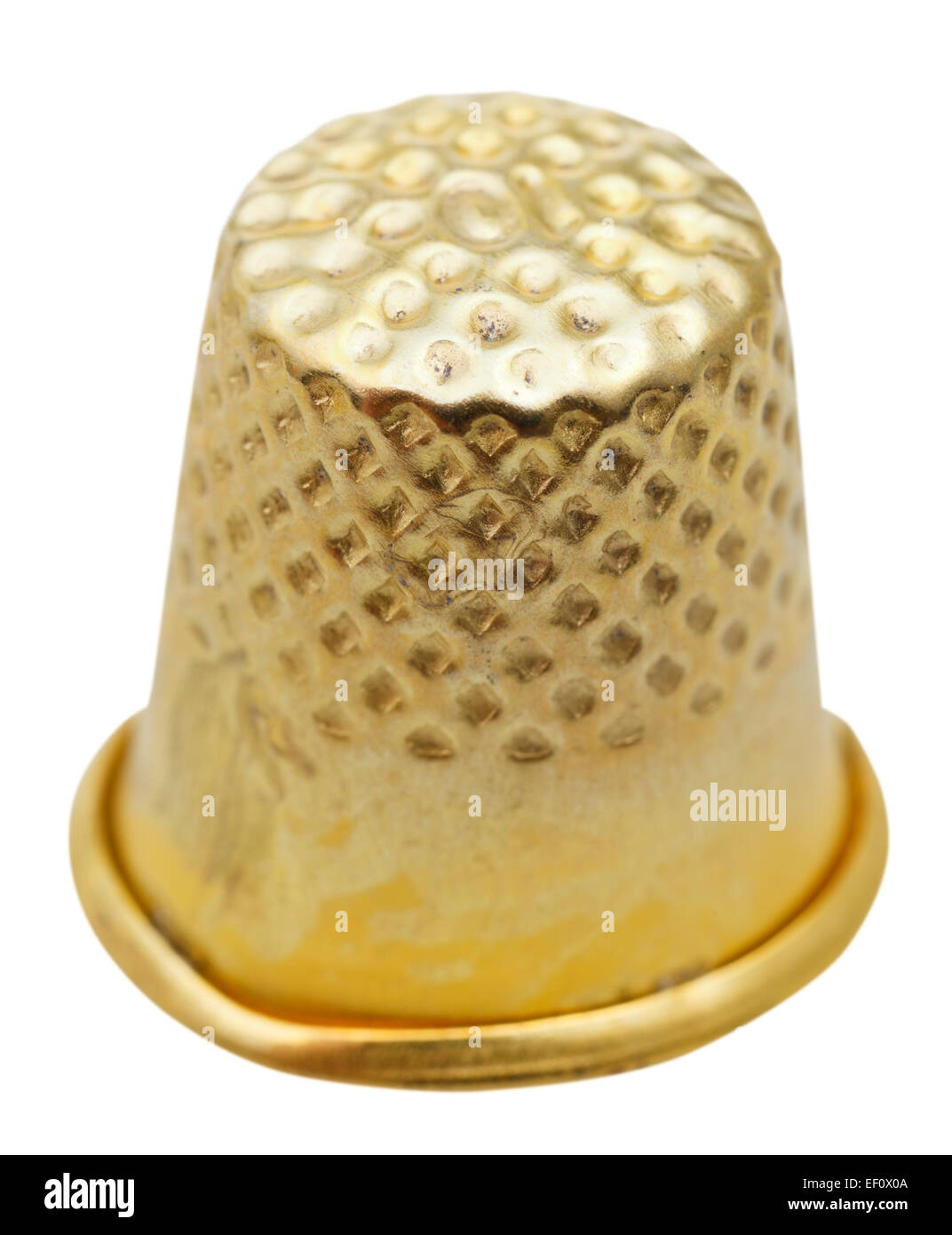 old sewing thimble isolated on white background Stock Photo - Alamy