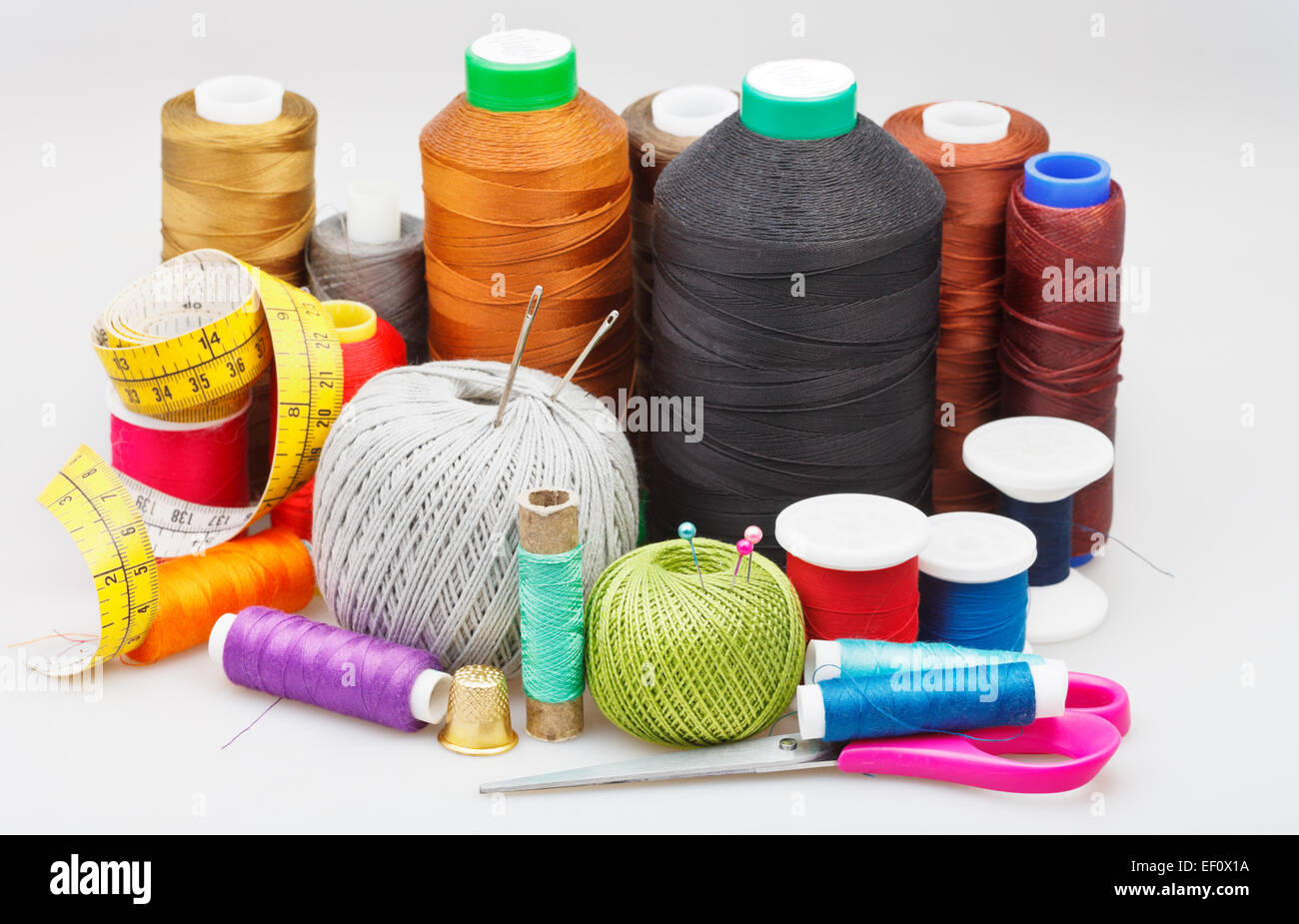 still life from sewing objects on gray background Stock Photo - Alamy