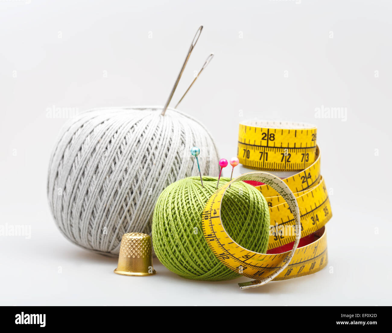 set from few sewing objects on gray background Stock Photo - Alamy