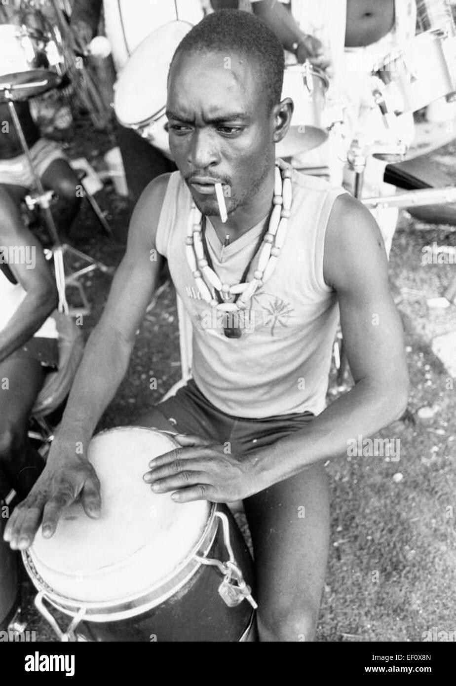 A drummer performs with a Haitian Rara band in Miami, showcasing a ...