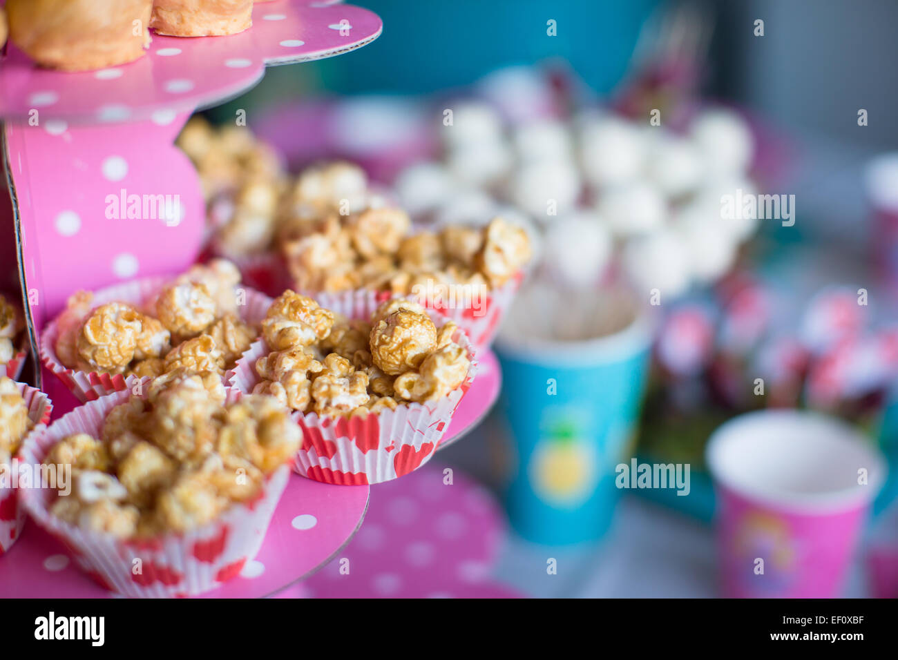 Portion popcorn on kid's party on sweet dessert table Stock Photo - Alamy