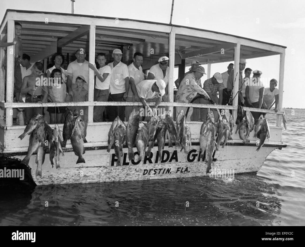 A party boat in Destin, Florida, is depicted in a lively scene. Destin ...