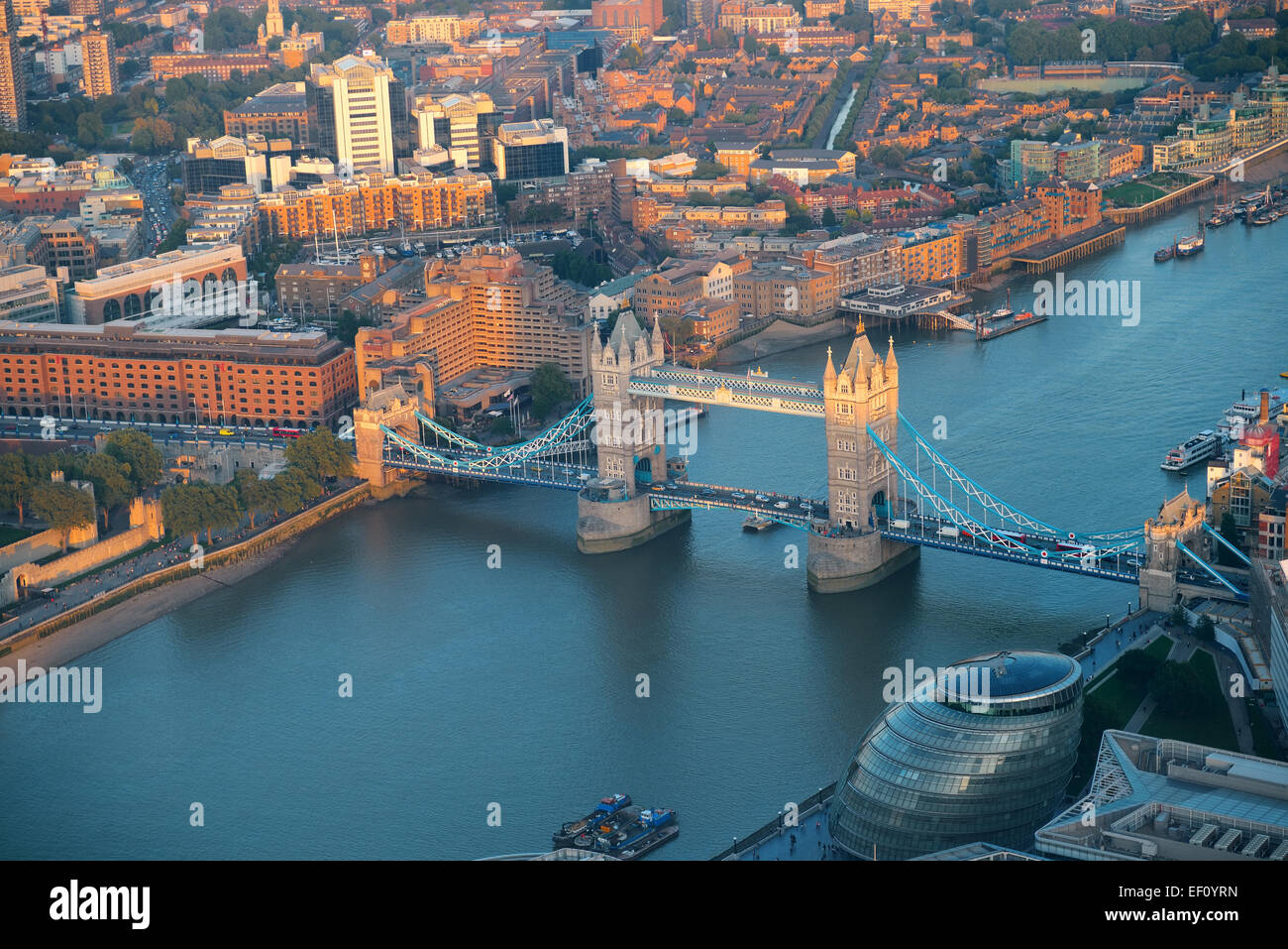 London rooftop view with Tower Bridge at sunset with urban ...