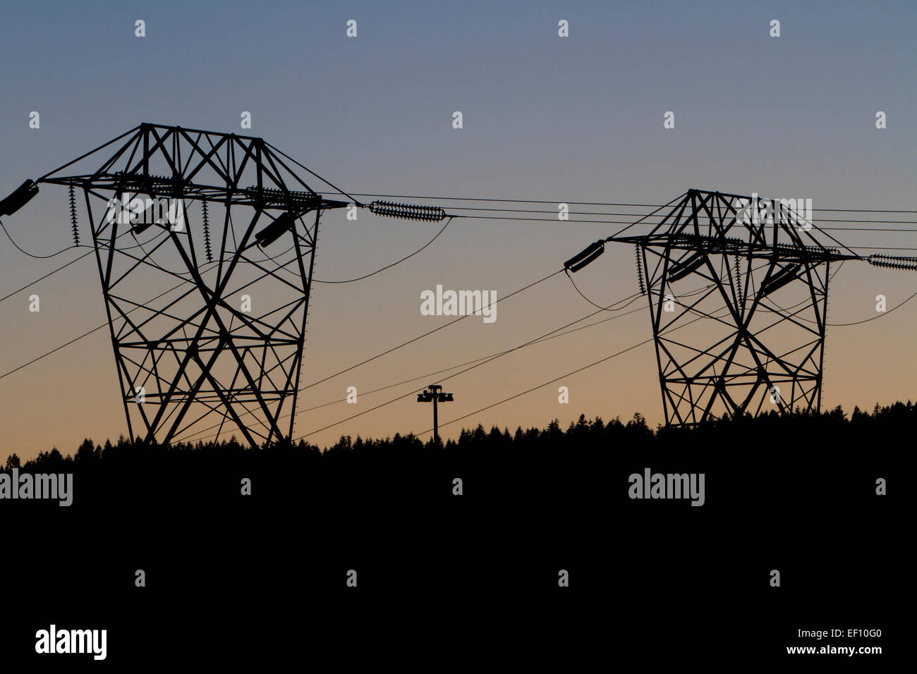 Transmission towers (electricity pylons) at dusk near Washougal Marina ...