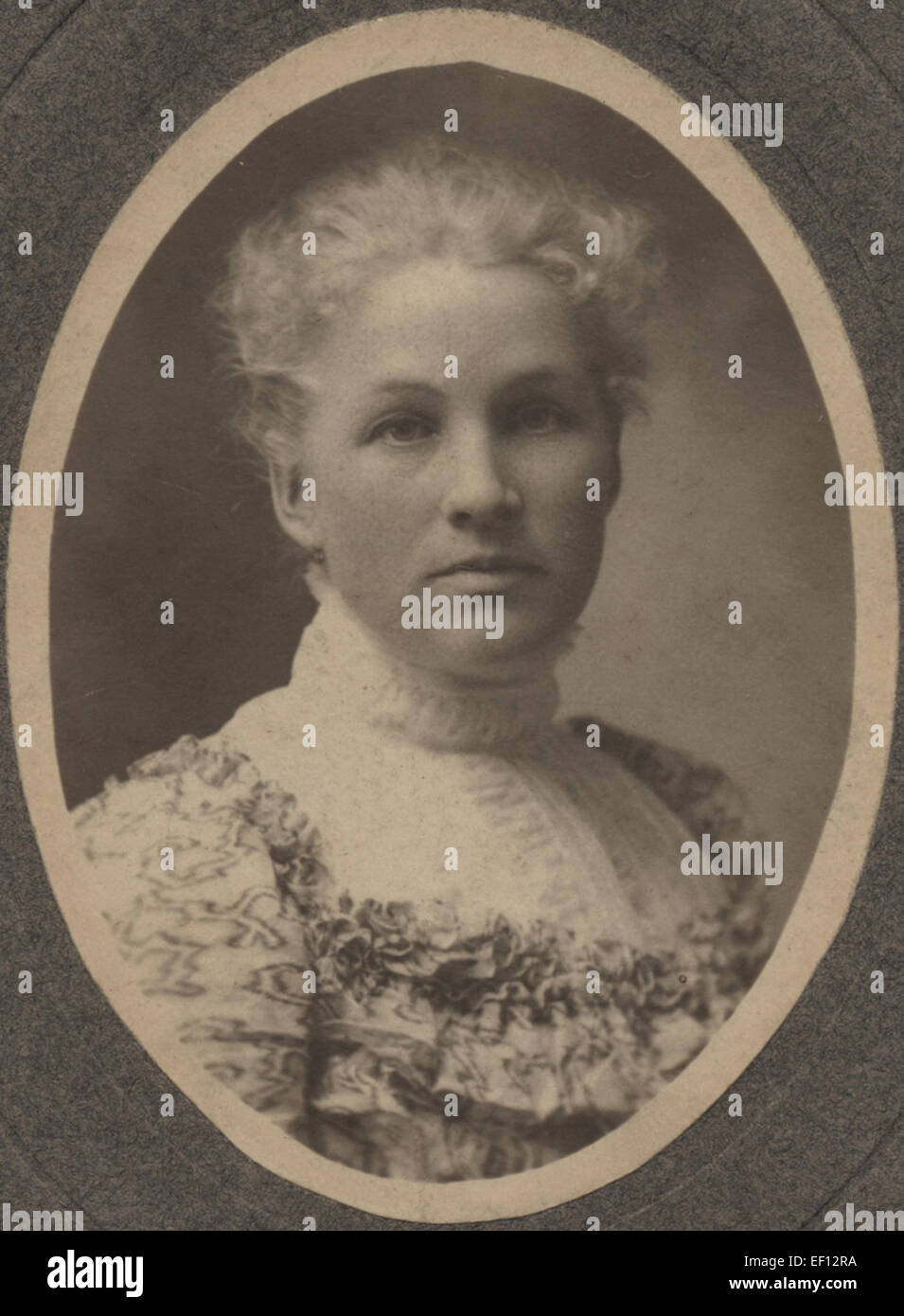 This portrait features a young woman from around 1900, showcasing ...