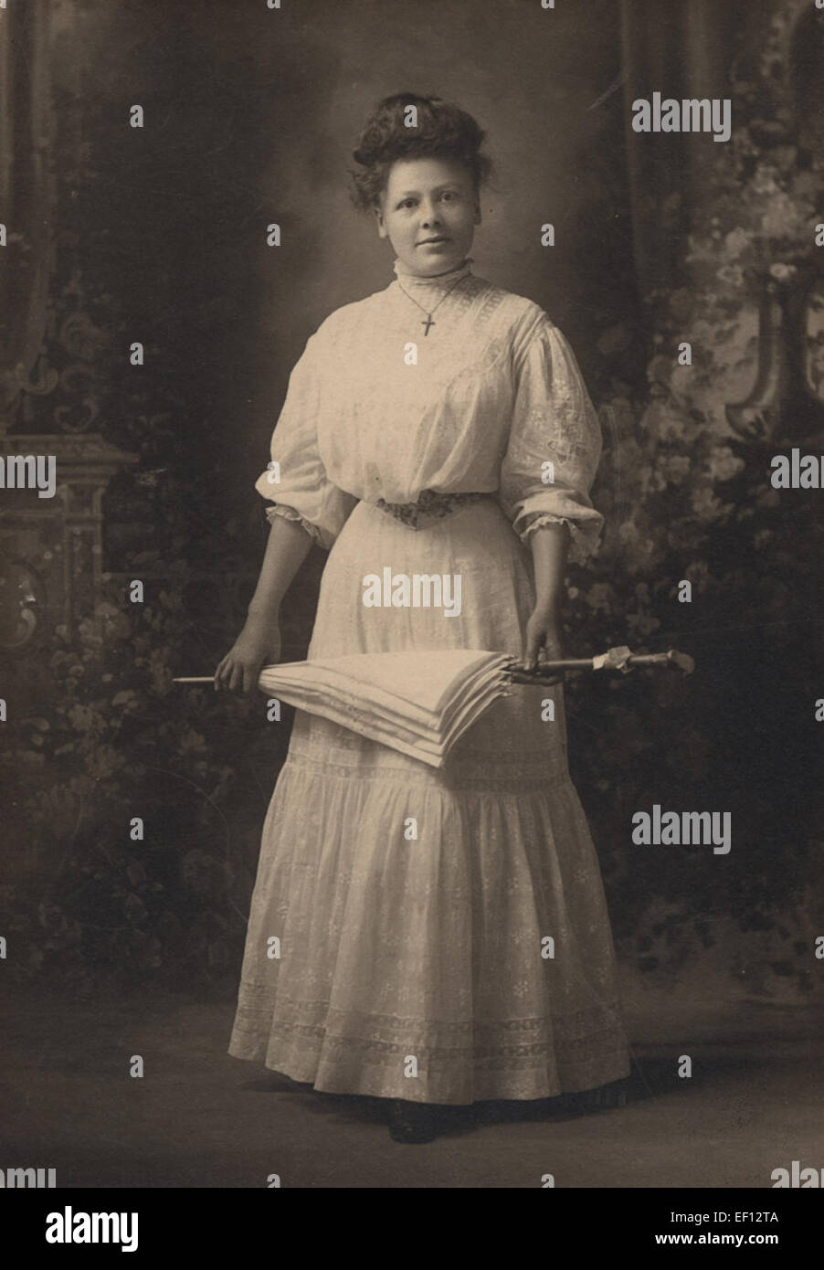 This portrait features Charlotte Maude Green (Langell), capturing her ...