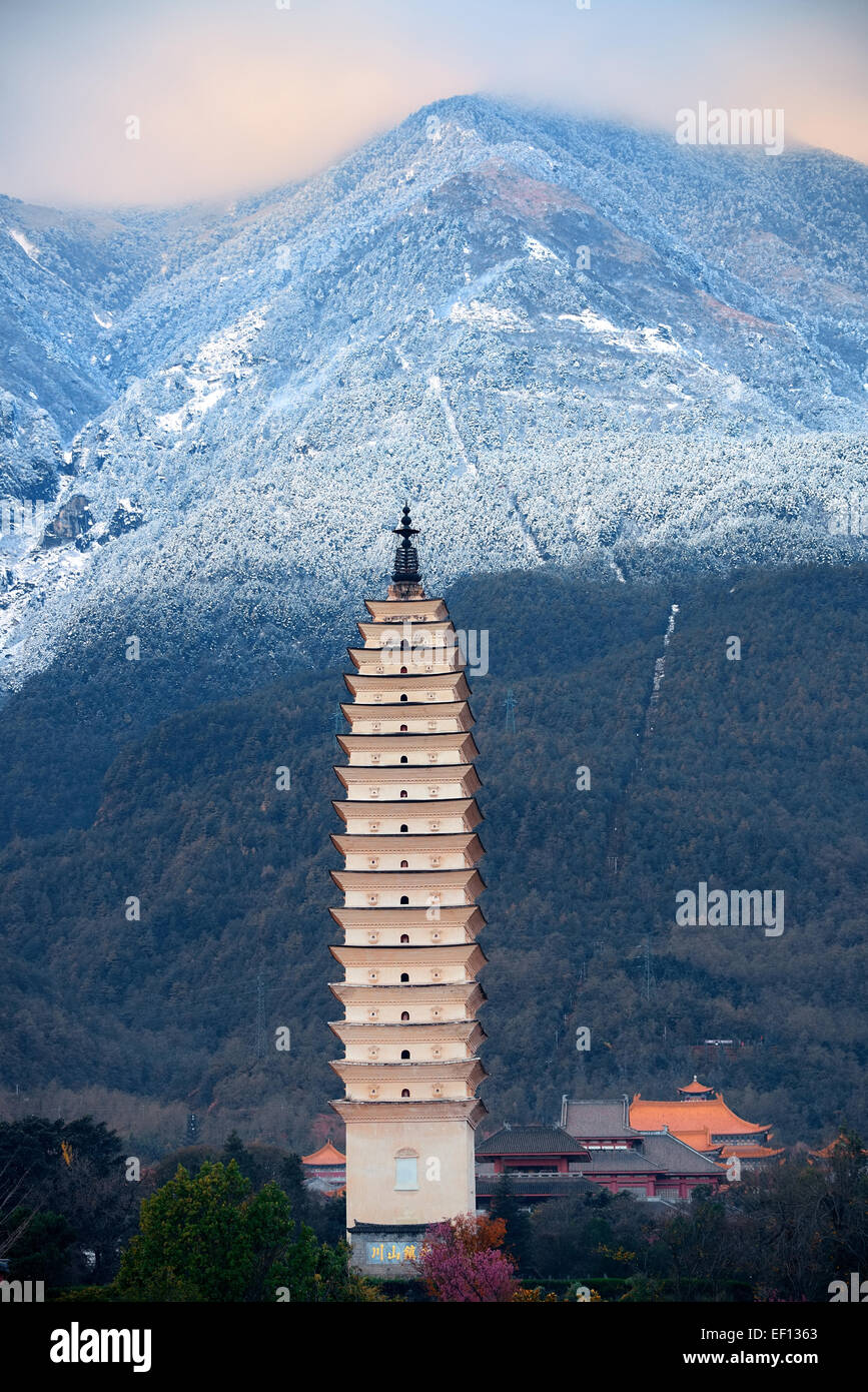 Ancient pagoda in Dali old town with snow capped Mt Cangshan, Yunnan ...