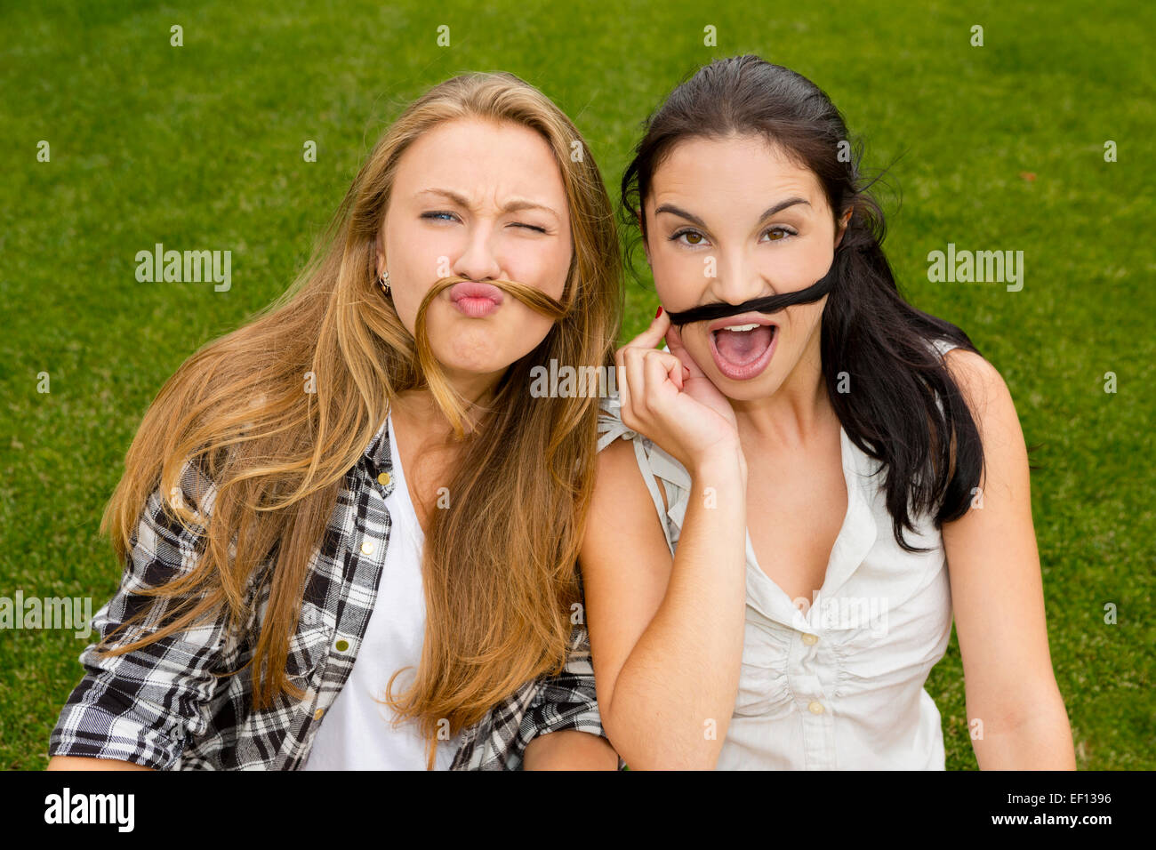 Outdoor portrait of a happy teenagers making funny faces Stock Photo ...