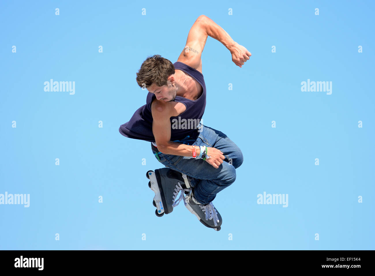 BARCELONA - JUN 28: A professional skater at the Inline skating jumps ...