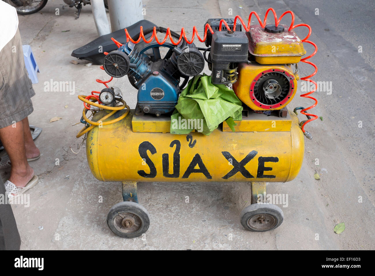 Motorcycle Air Compressor or Pump on the street of Ho Chi Minh City ...
