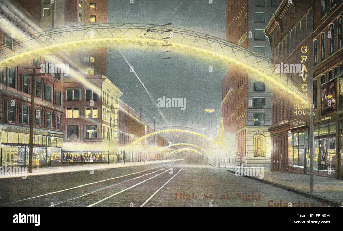 This photograph shows High Street at night, capturing the urban ...