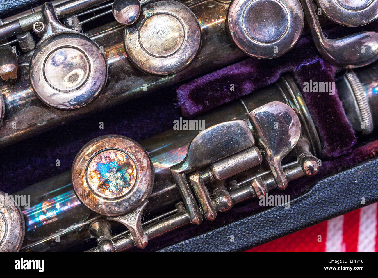 Close up of an dirty old flute in case. Forgotten unloved musical ...