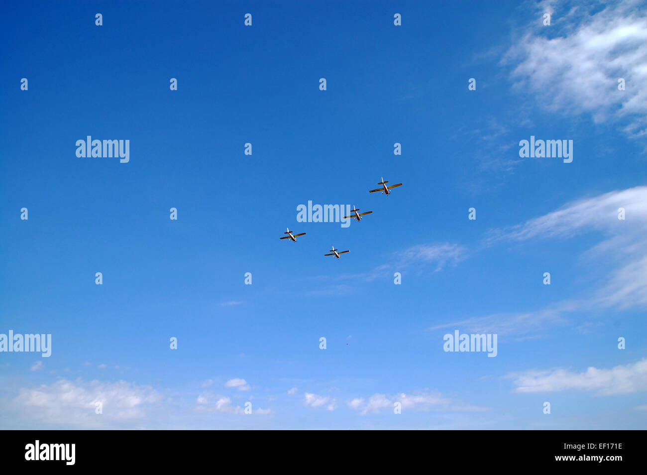 Group of old piston planes flying in formation at an air show in Vrsac ...