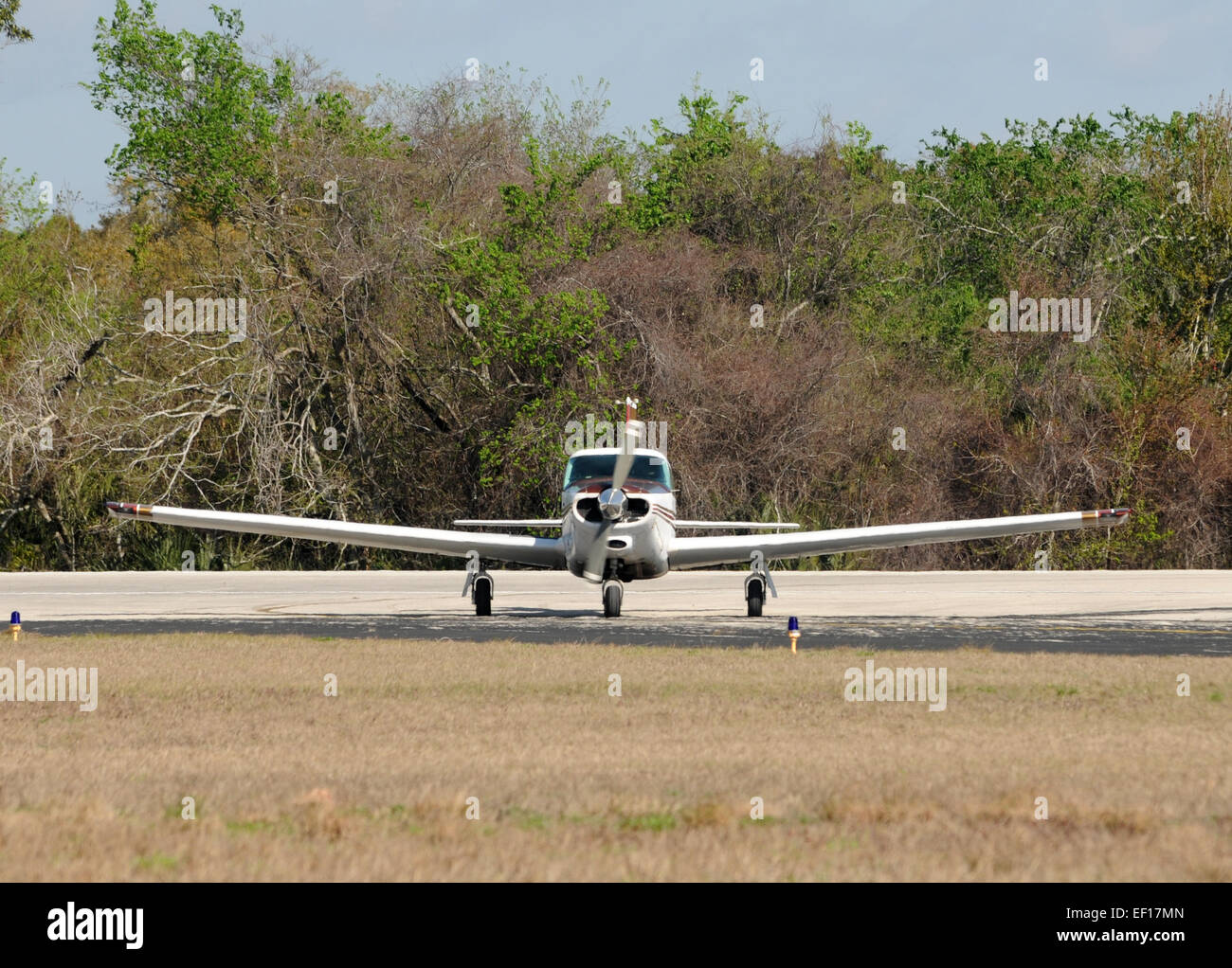 Light private airplane taxiing front view Stock Photo - Alamy
