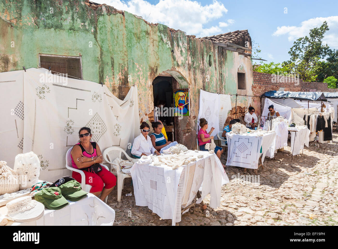 Local women stallholders at an outdoor street market in Trinidad, Cuba ...