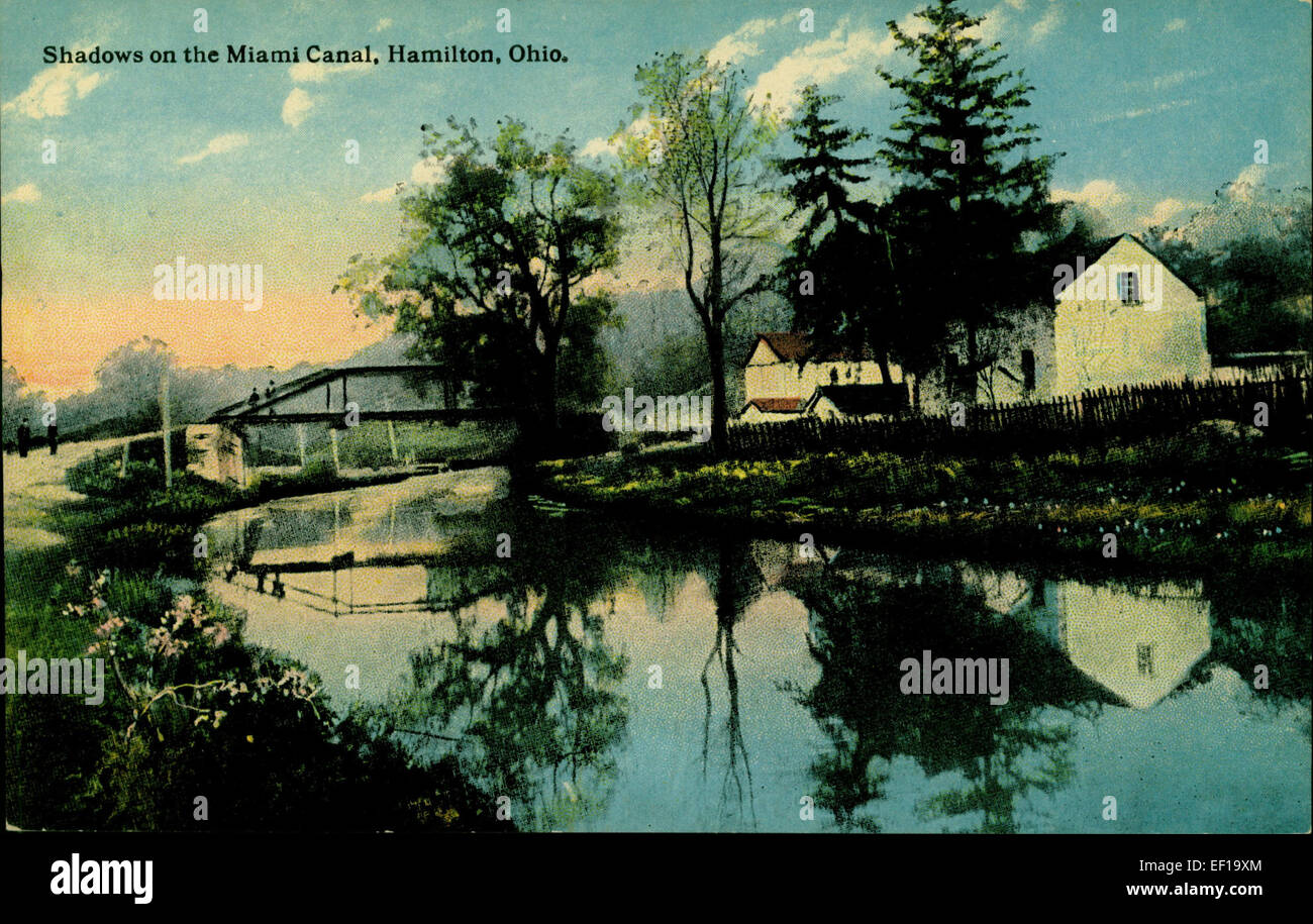 A serene photograph of the Miami Canal, capturing the shadows cast by ...
