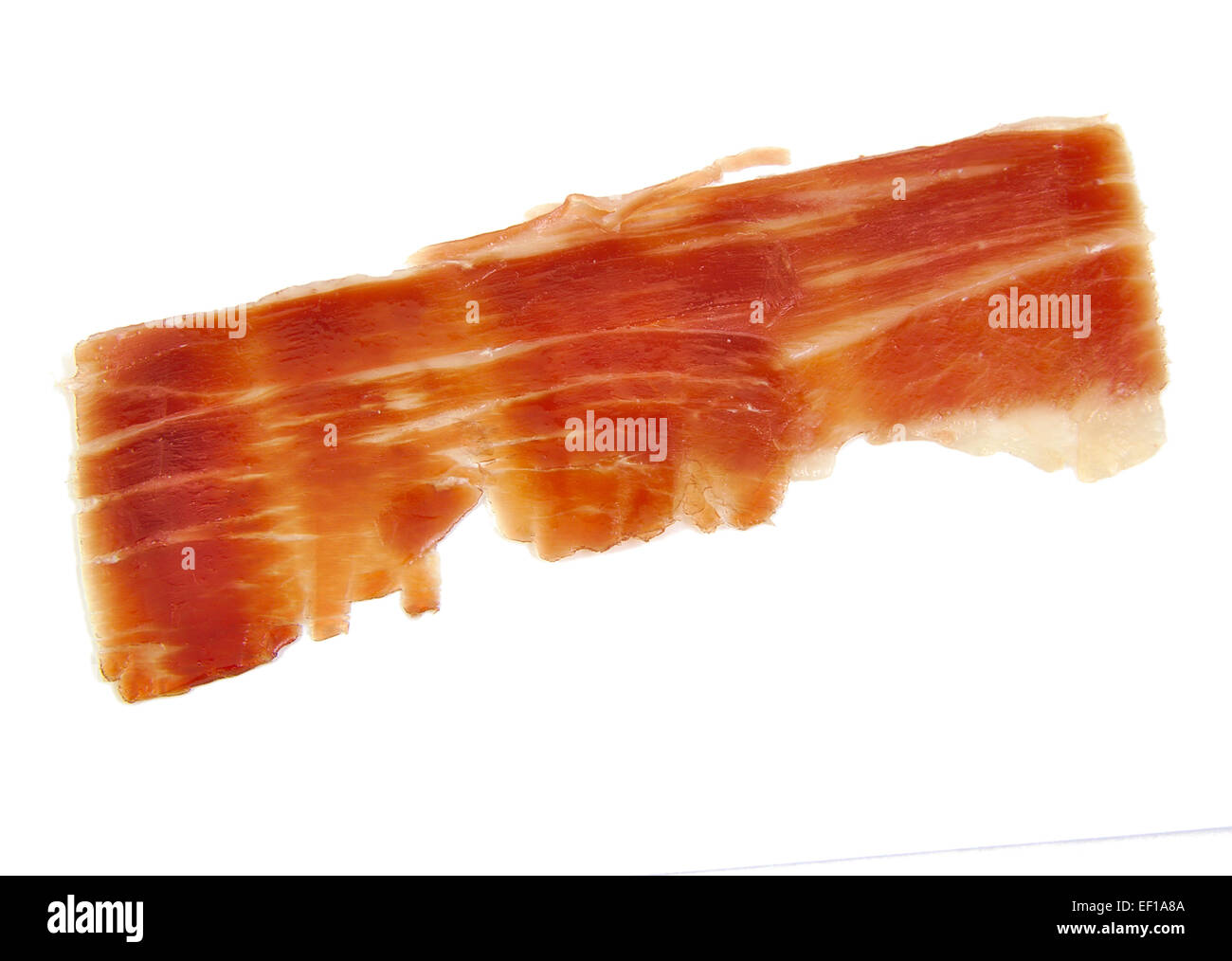 Spanish serrano ham slice isolated on white background Stock Photo - Alamy