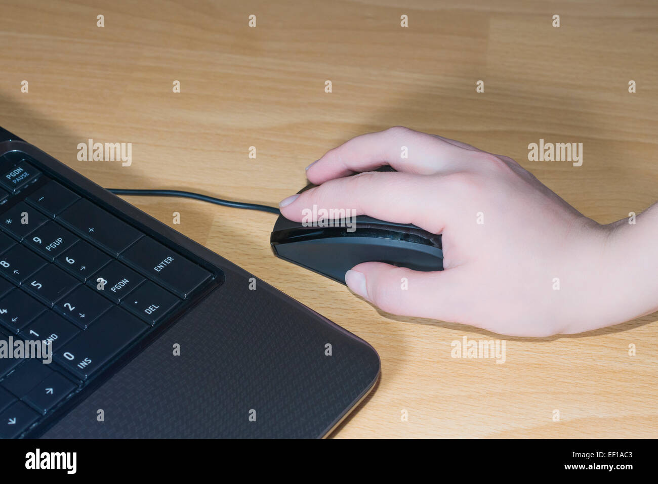 Child touching laptop keyboard hi-res stock photography and images - Alamy
