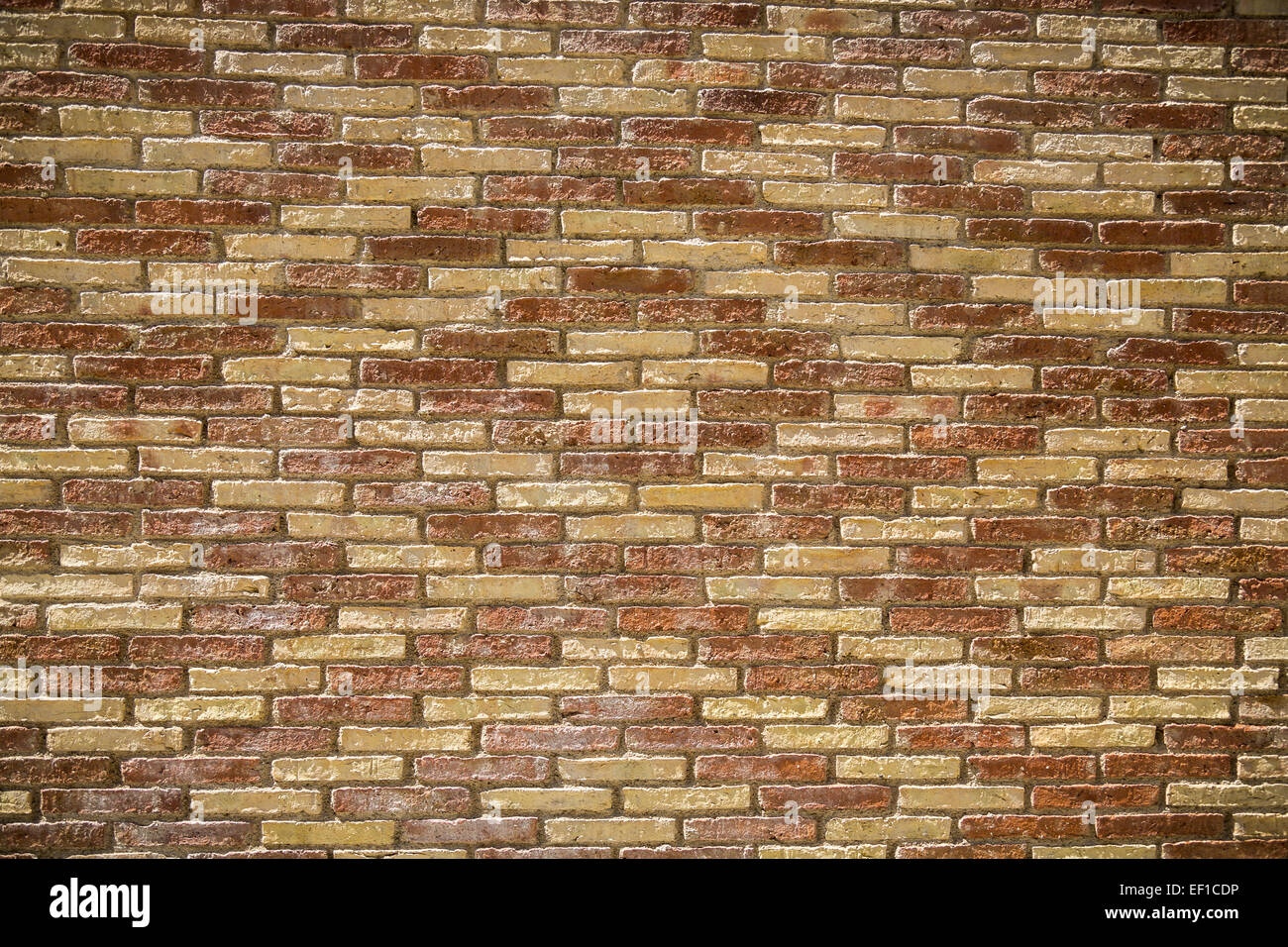 red and yellow brick wall with pattern Stock Photo - Alamy