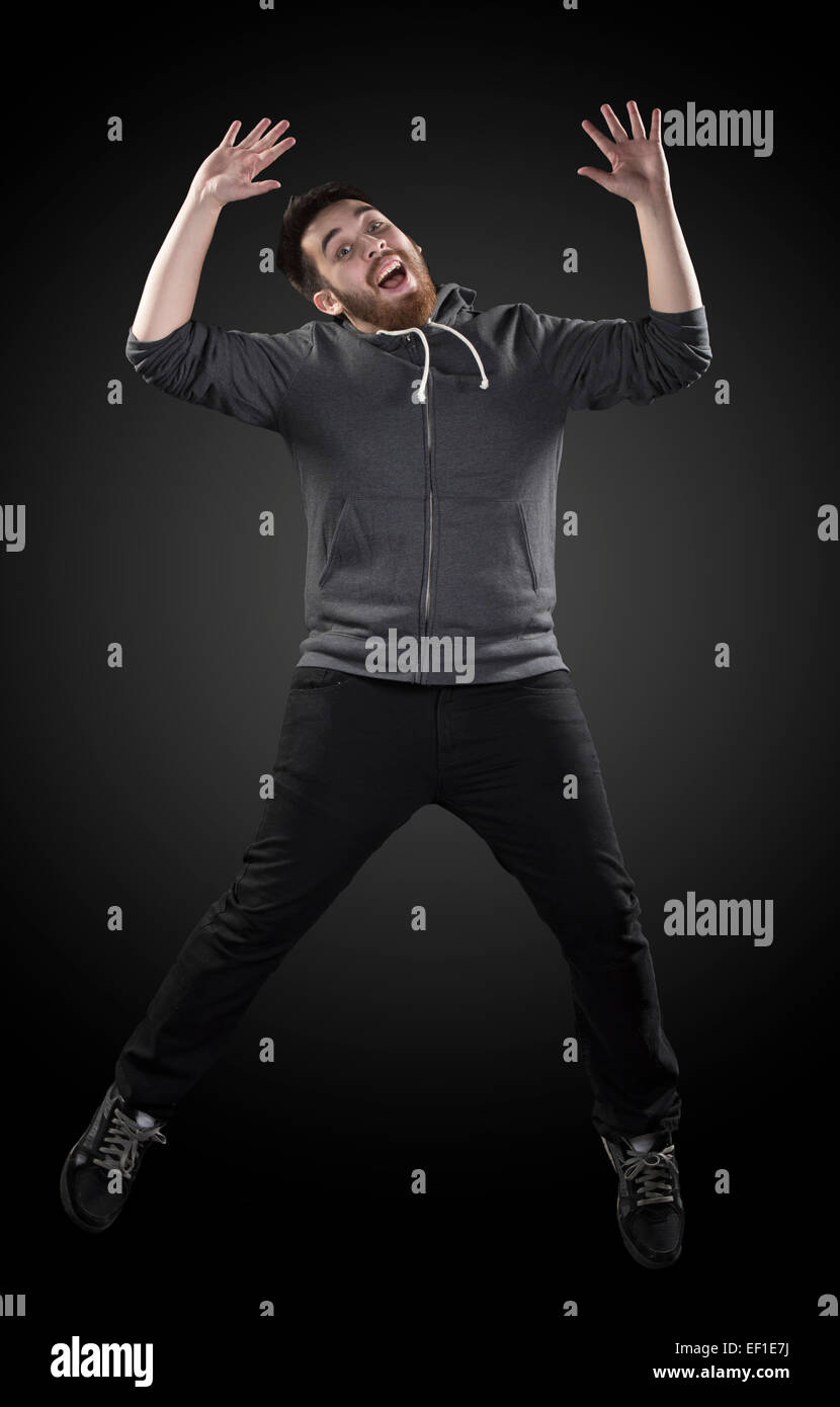 Full Length Shot of Young Man in Wacky Pose Stock Photo - Alamy