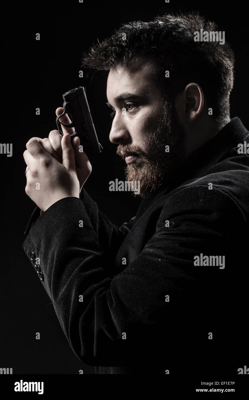 Pistol facing left hi-res stock photography and images - Alamy