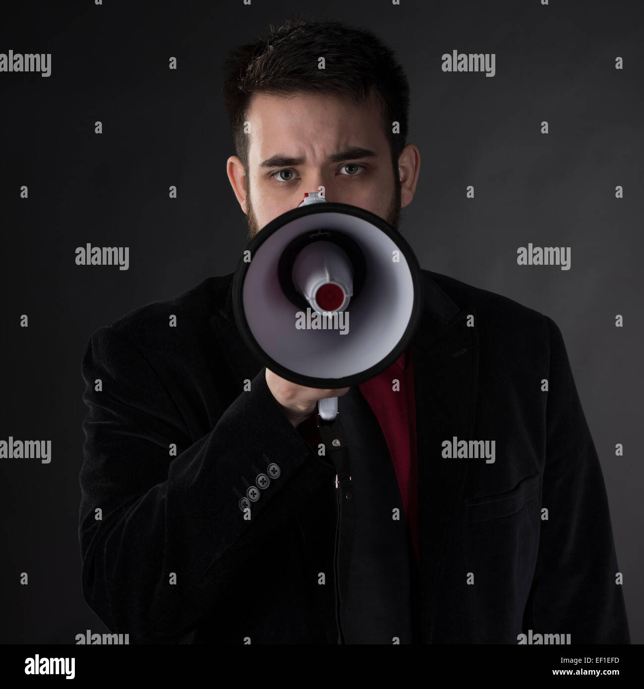 Close up Serious Man Holding Megaphone Stock Photo - Alamy