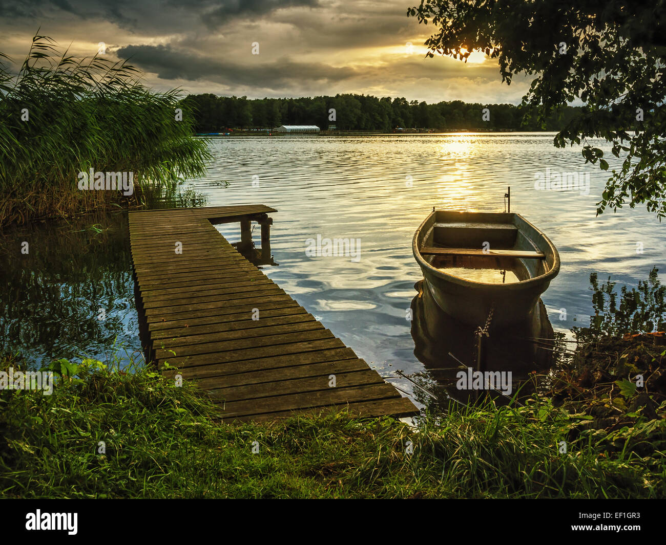Boat lake sunset hi-res stock photography and images - Alamy