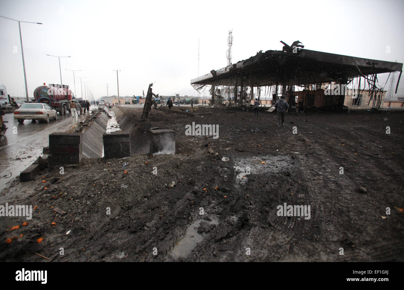 Kabul, Afghanistan. 25th Jan, 2015. Policemen inspect the destroyed gas ...