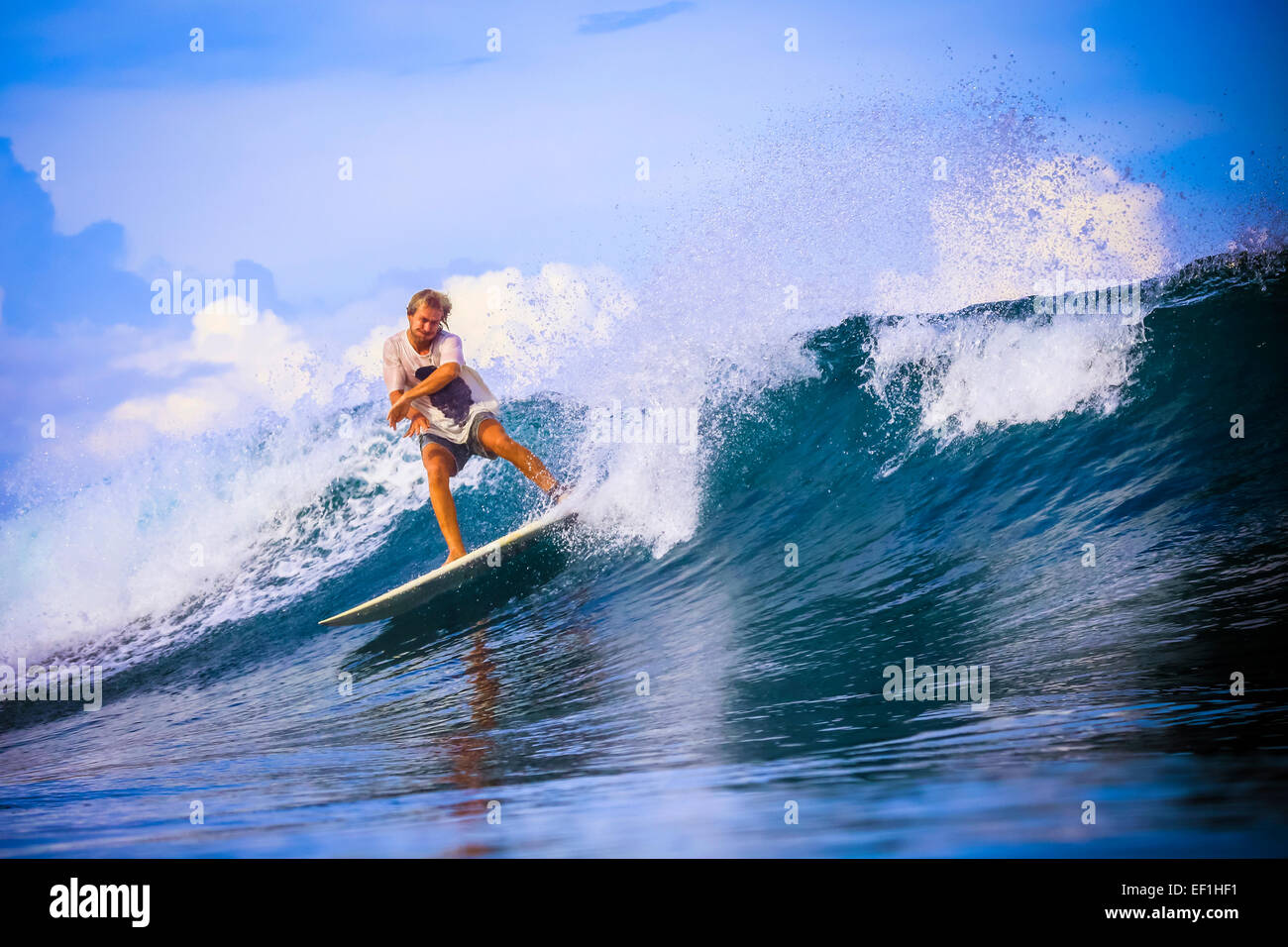 Surfer on Amazing Blue Wave, Bali island Stock Photo - Alamy