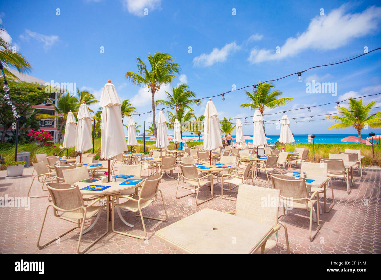 Outdoor cafe on tropical beach Stock Photo - Alamy