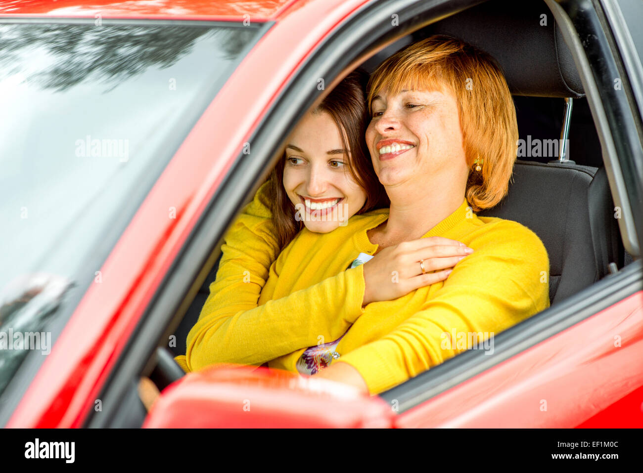 Daughter hug mom car hi-res stock photography and images - Alamy