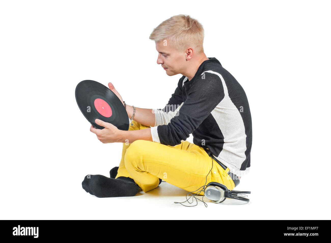 Guy with headphones and vinyl Stock Photo - Alamy