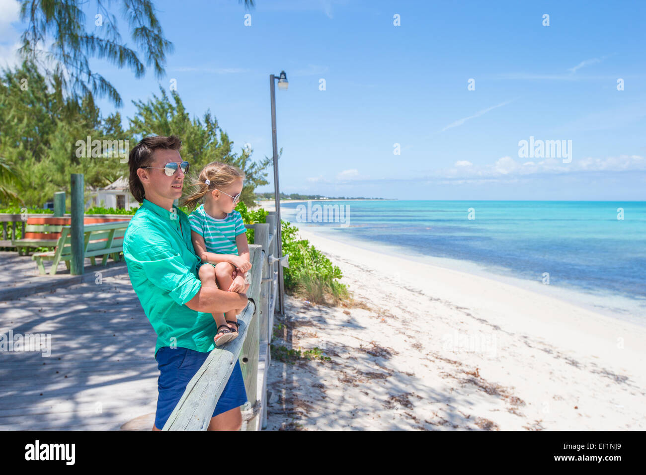 Young dad and his daughter walking on tropical island Stock Photo - Alamy
