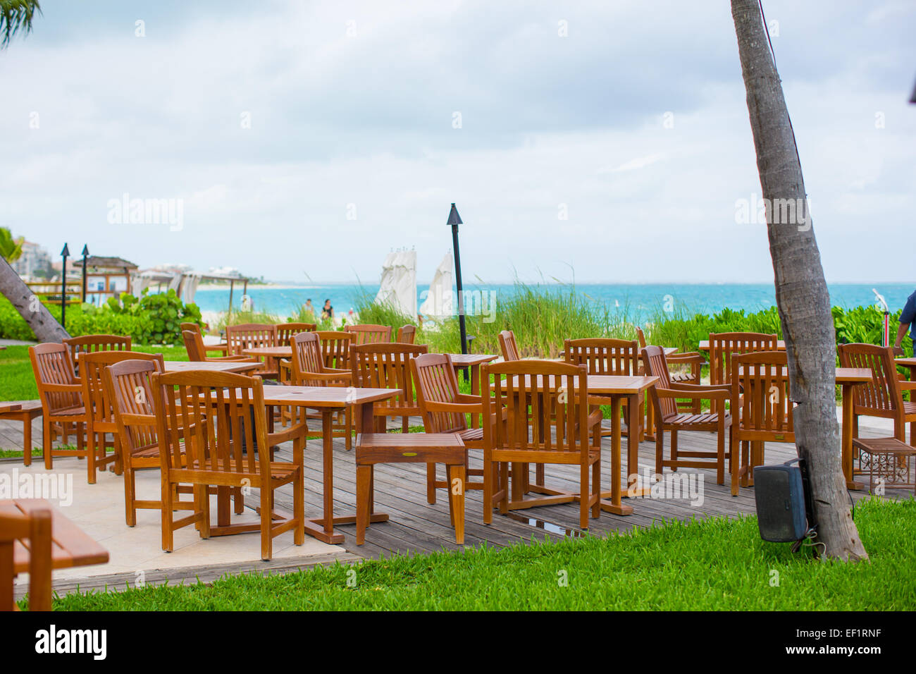 Outdoor cafe on tropical beach at Caribbean Stock Photo - Alamy