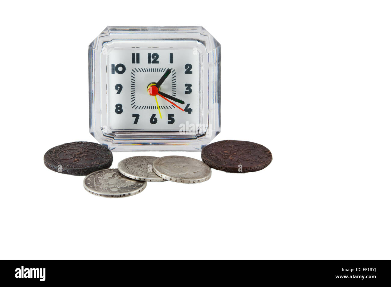old alarm clock and old money - everything goes Stock Photo - Alamy